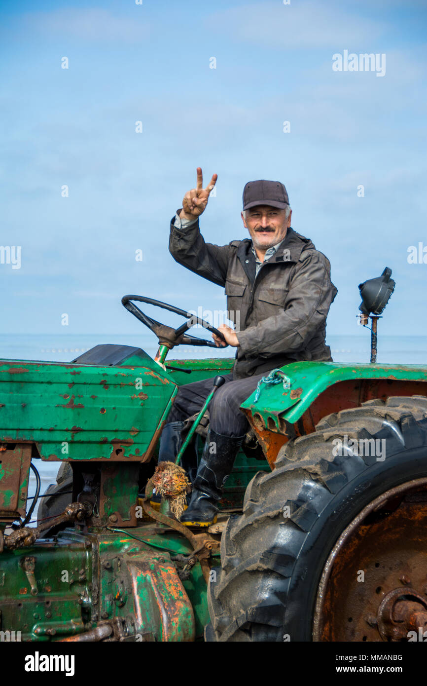 man on the tractor Stock Photo - Alamy