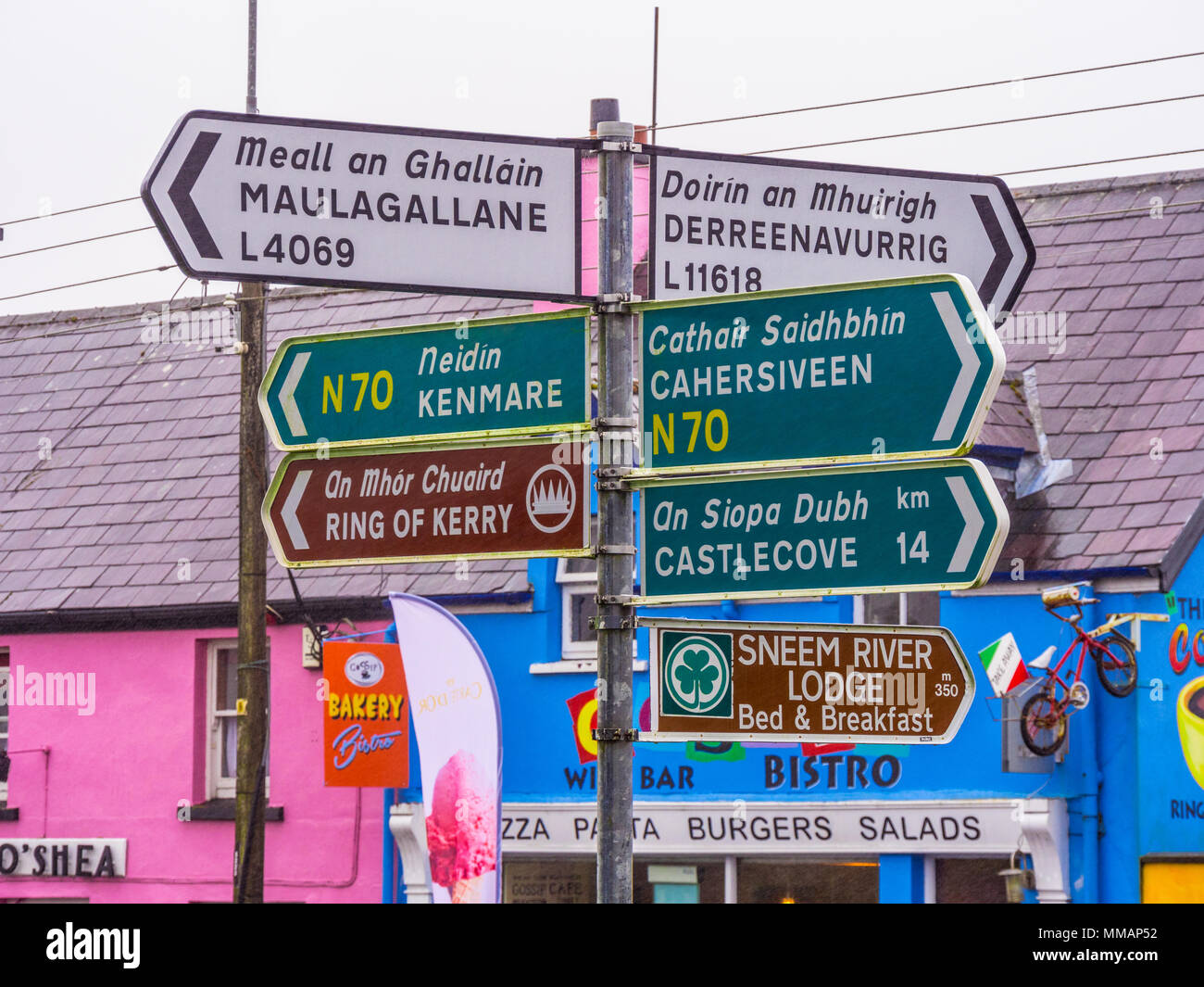 Direction signs in the Irish town of Sneem - KERRY / IRELAND - MAY 5 ...