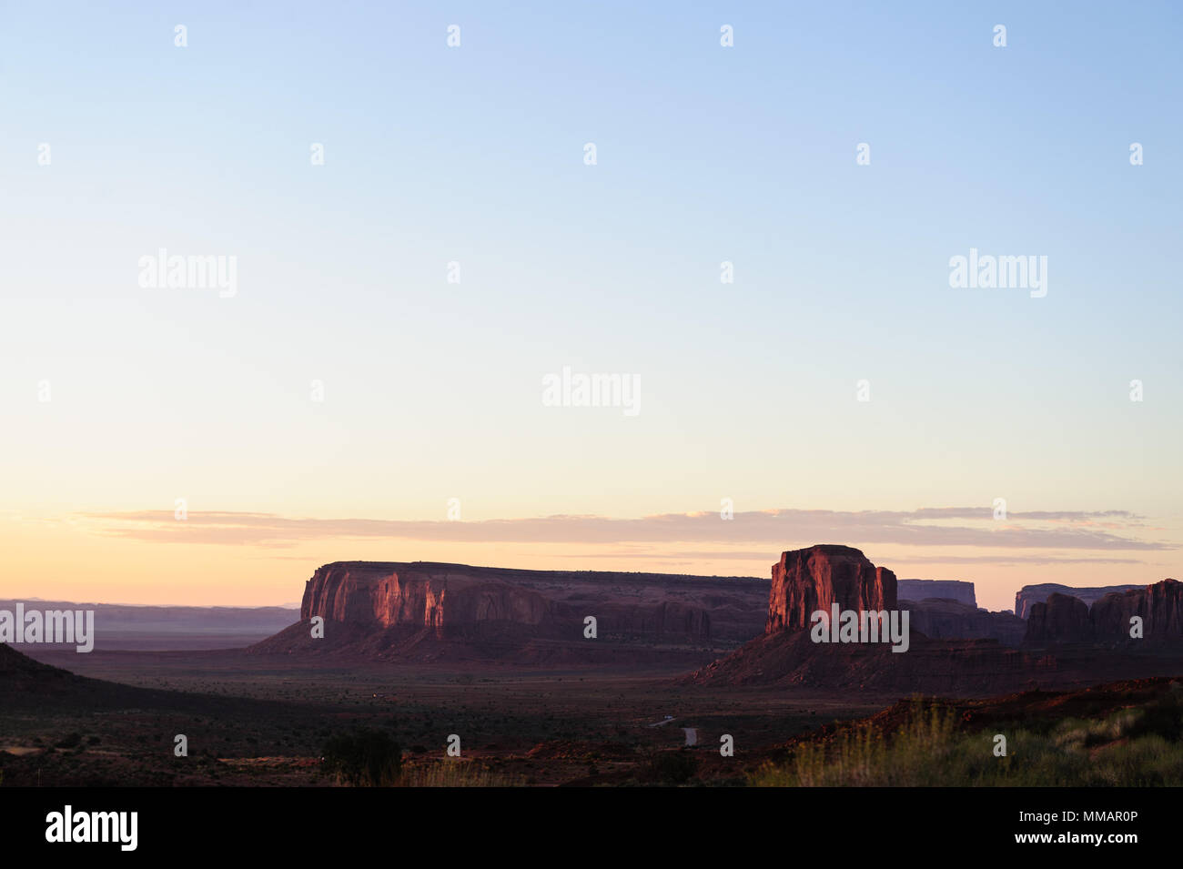 Sunrise over Monument Valley Stock Photo - Alamy