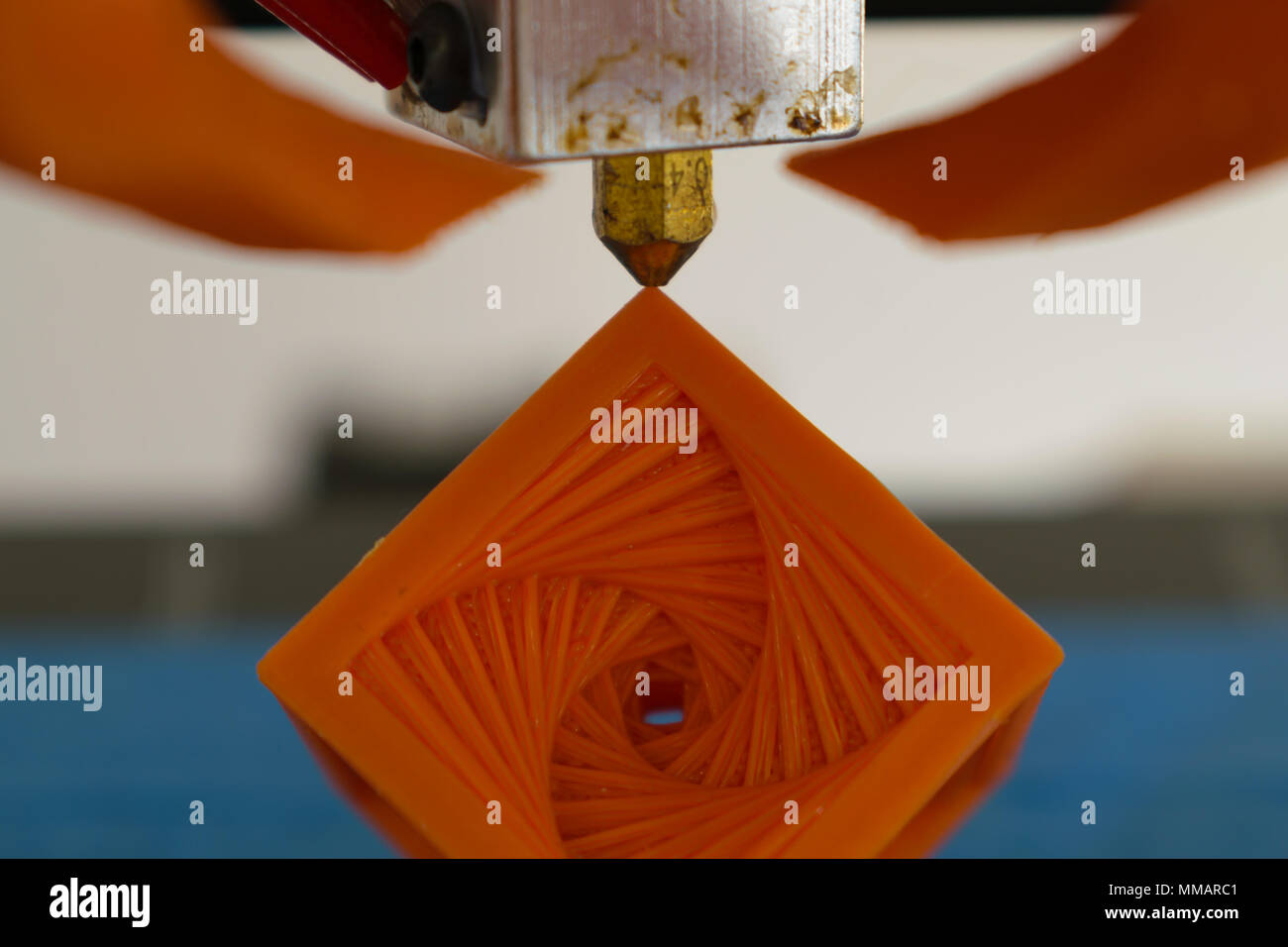 3d printer hot-end nozzle with printed object concept Stock Photo - Alamy