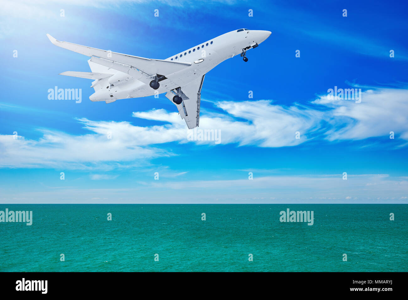 Small passenger plane approaches to the tropical resort Stock Photo - Alamy