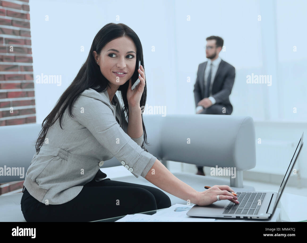 Woman assistant at her workplace Stock Photo - Alamy