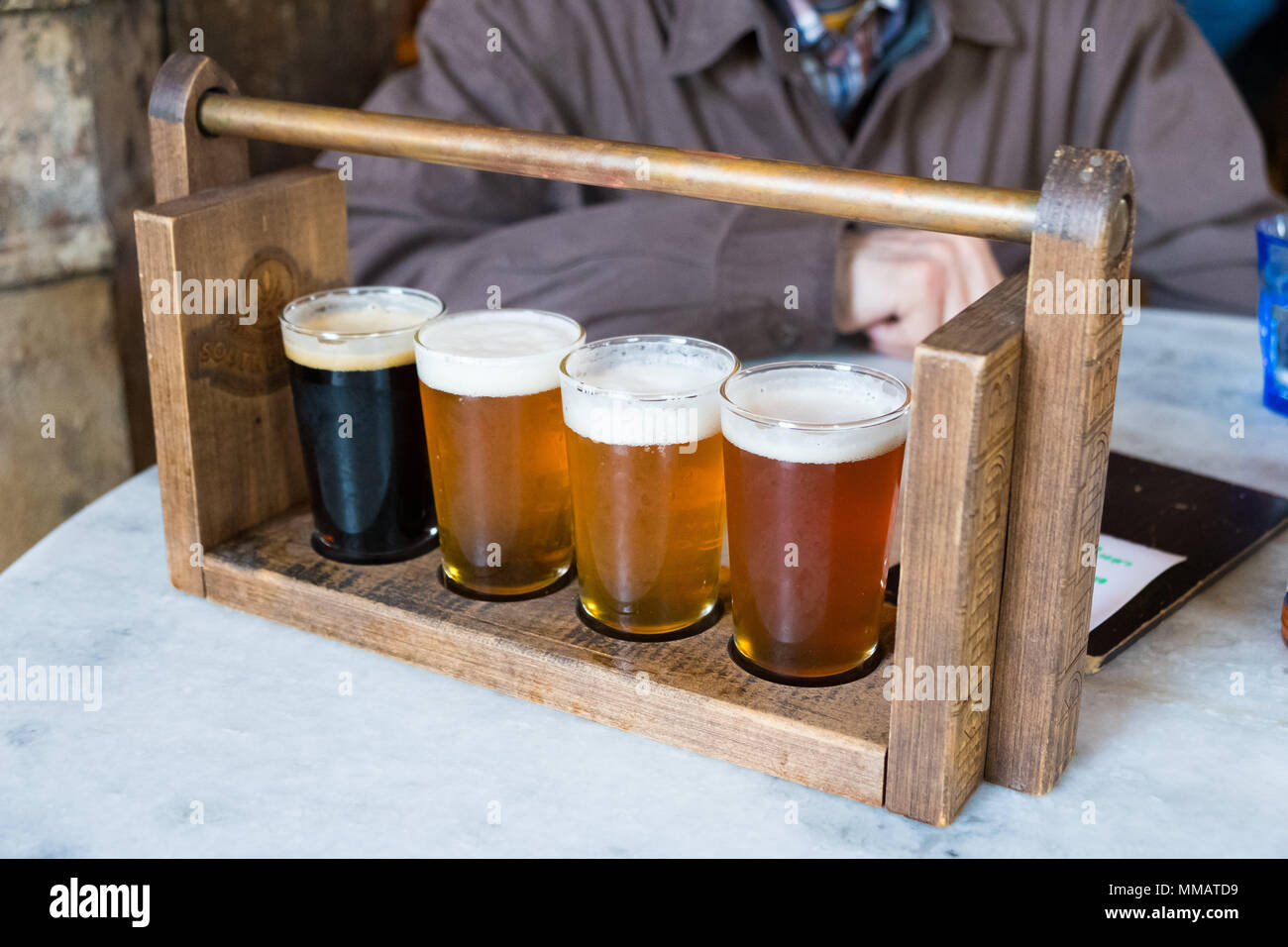 Craft Beer Sampler Four Glasses Stock Photo - Alamy