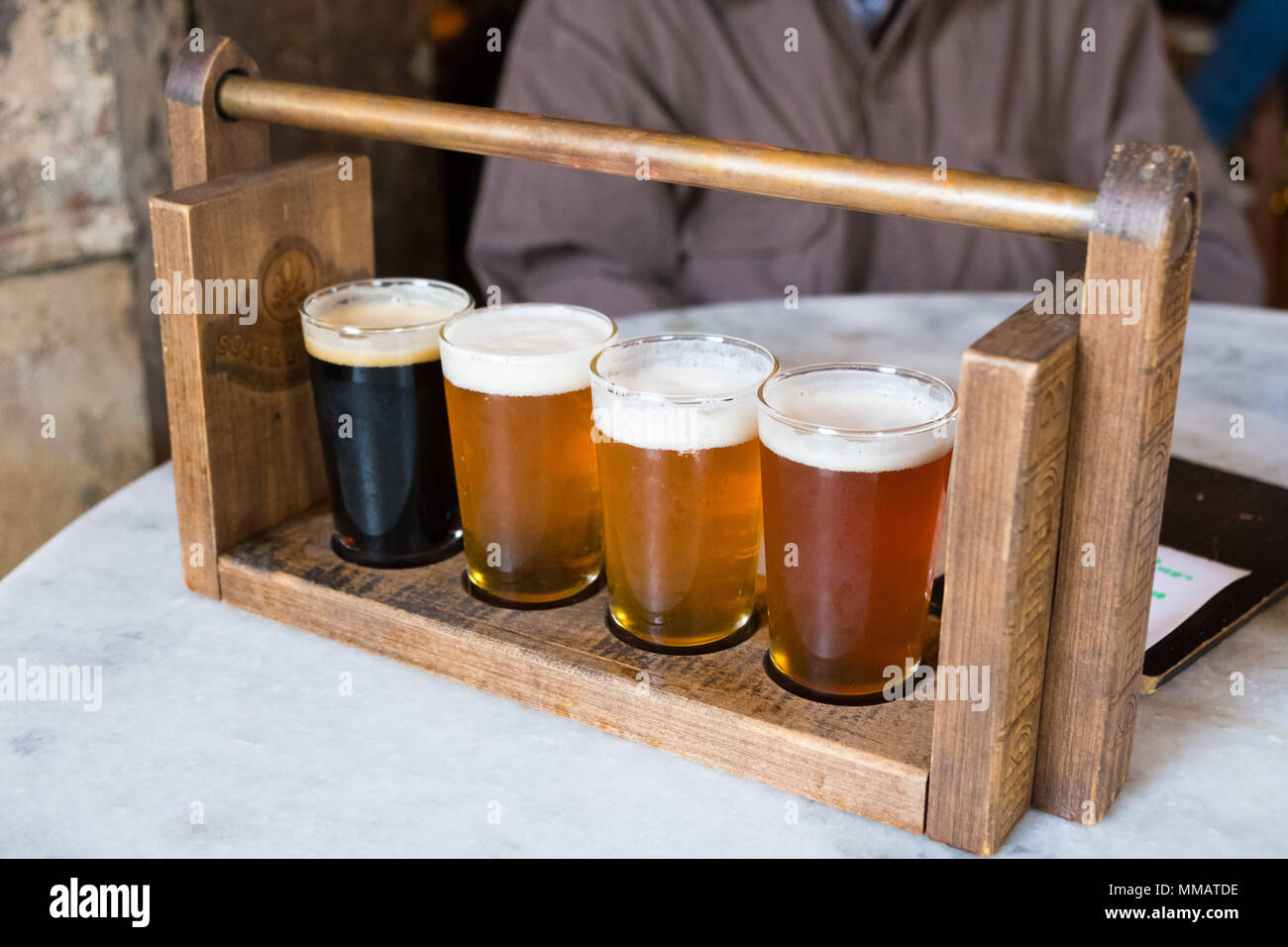 Craft Beer Sampler Four Glasses Stock Photo - Alamy