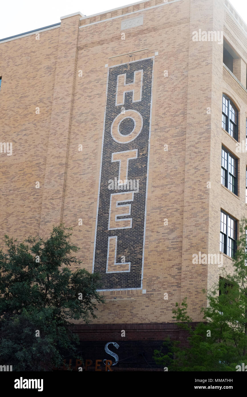 Hotel Painted Sign on Brick Stock Photo - Alamy