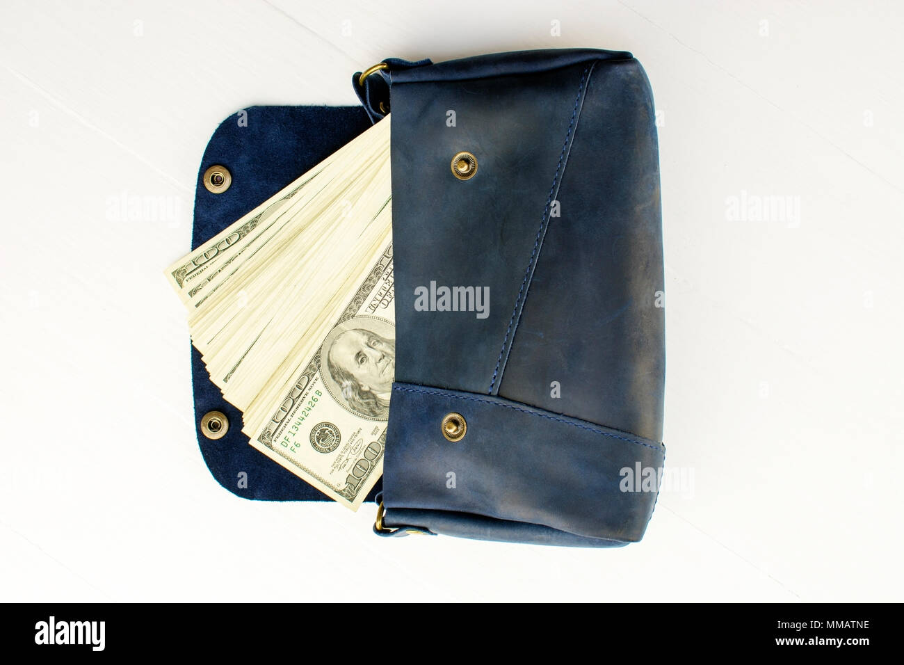 money in bag on white background Stock Photo - Alamy