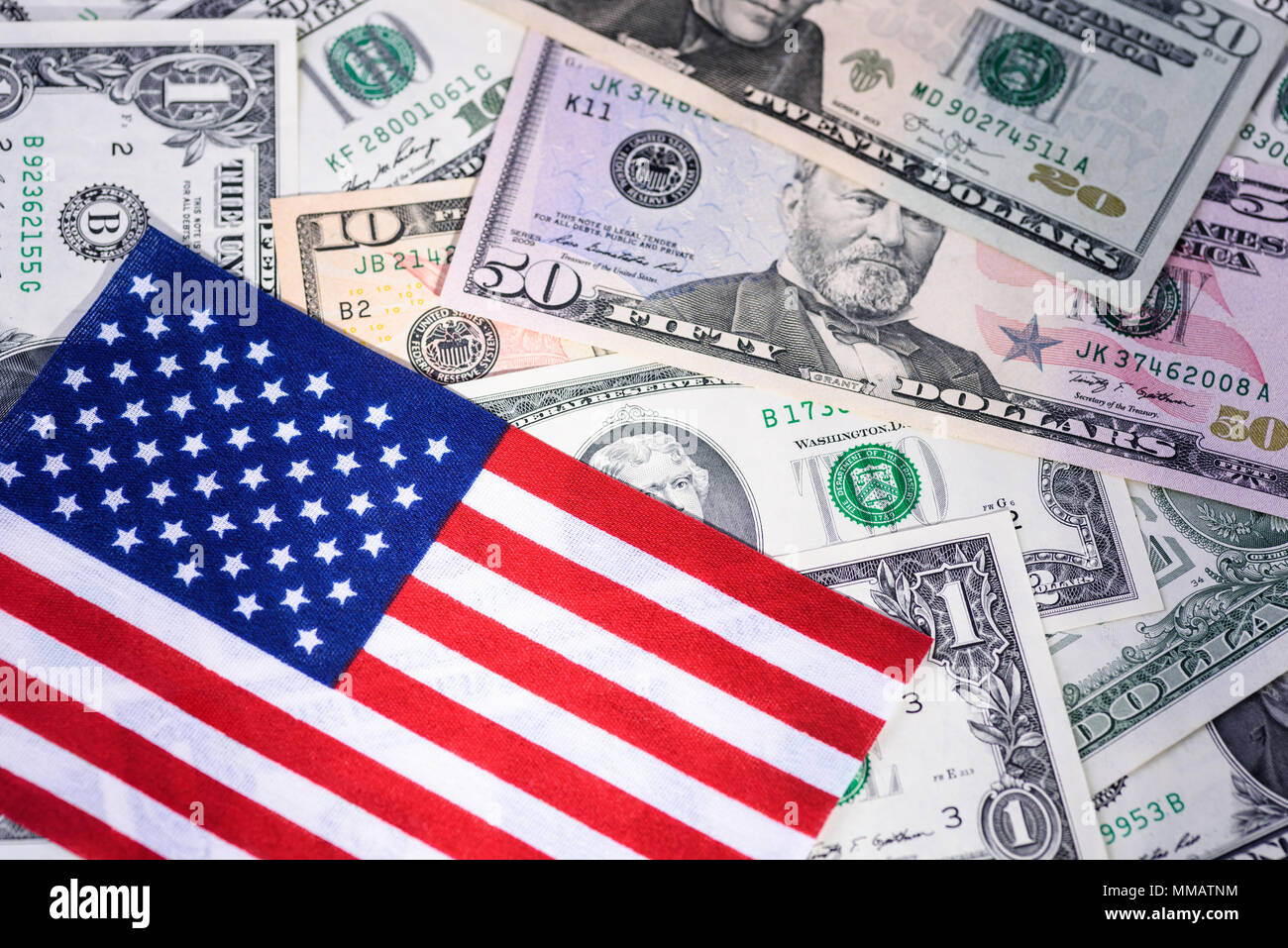 American flag on assorted banknotes. Money, cash background. Financial ...