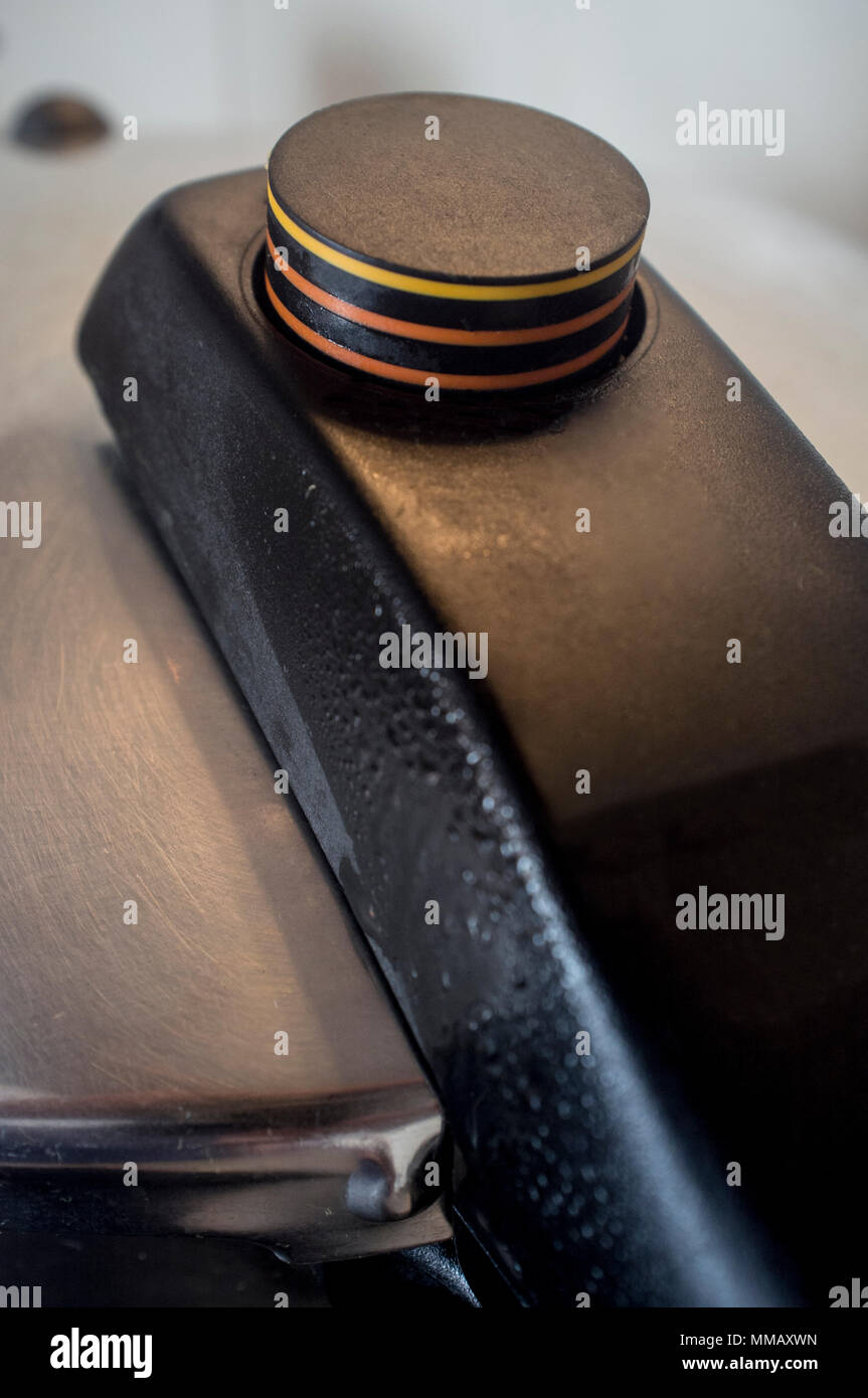 Stainless Steel Pressure Cooker at work. Rising indicator detail with ...