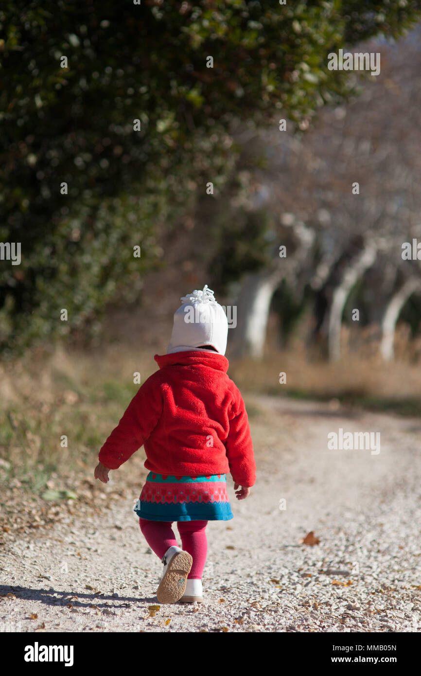 Baby girl rear view hi-res stock photography and images - Alamy