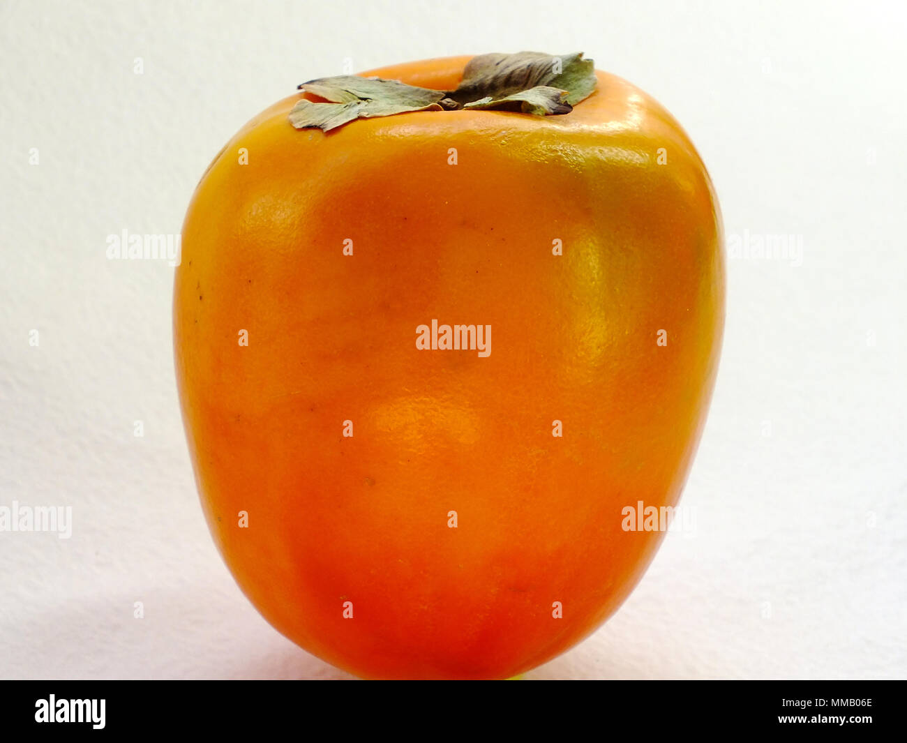 Persimmon in still life hi-res stock photography and images - Alamy
