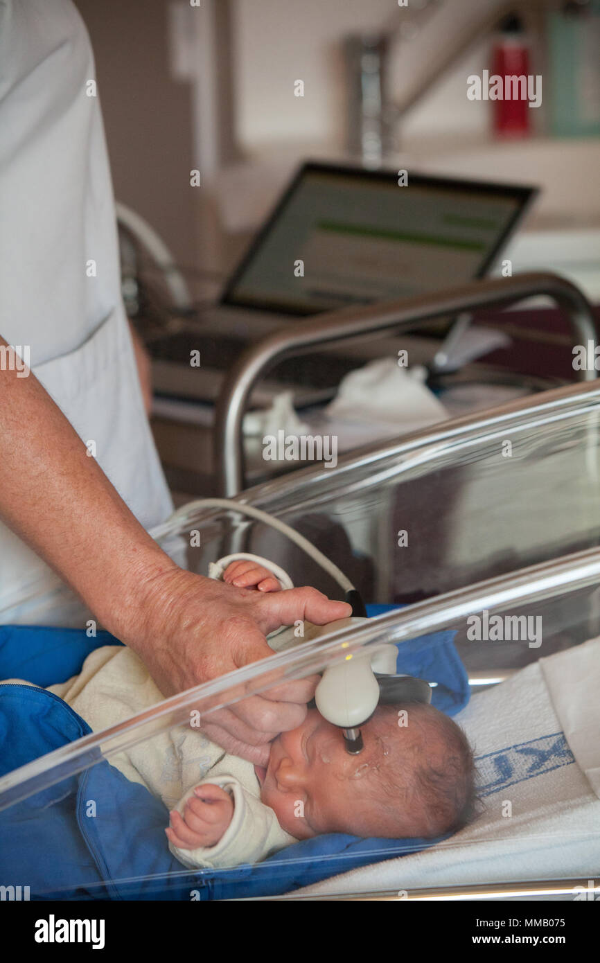 Newborn hearing screening hi-res stock photography and images - Alamy