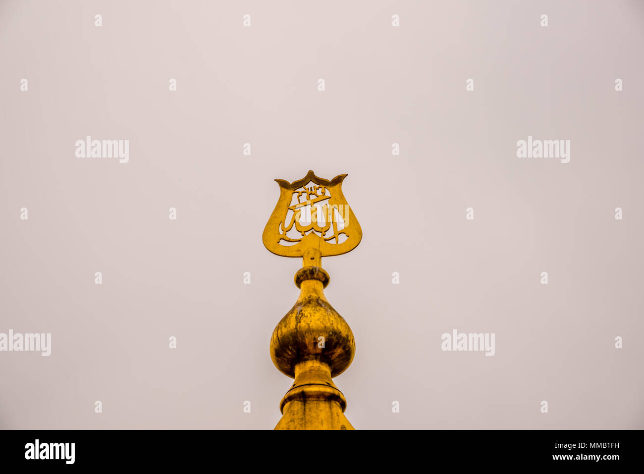 Word of Allah written in Arabic on metallic to put on top of an Islamic ...