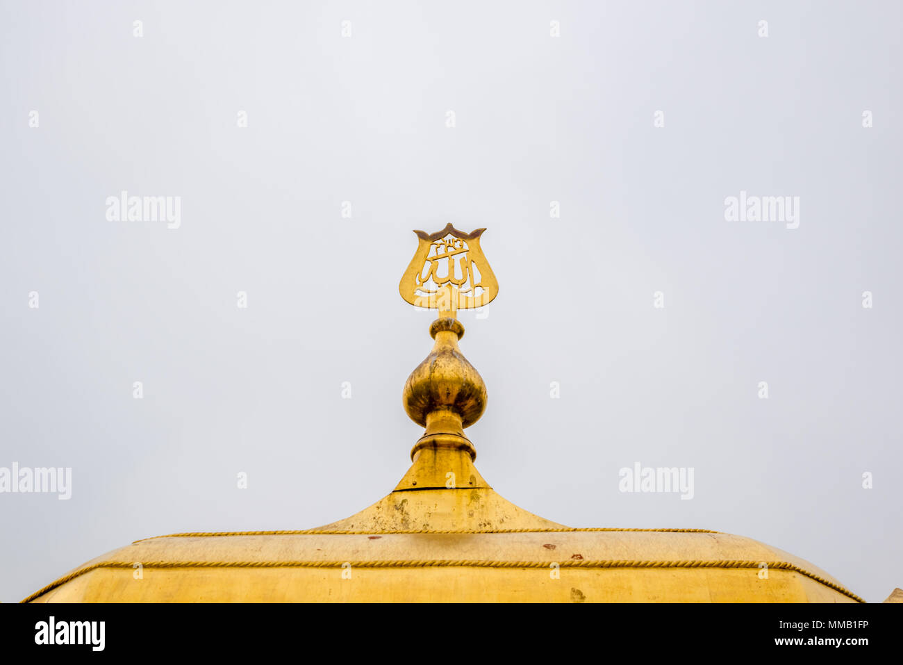 Word of Allah written in Arabic on metallic to put on top of an Islamic ...