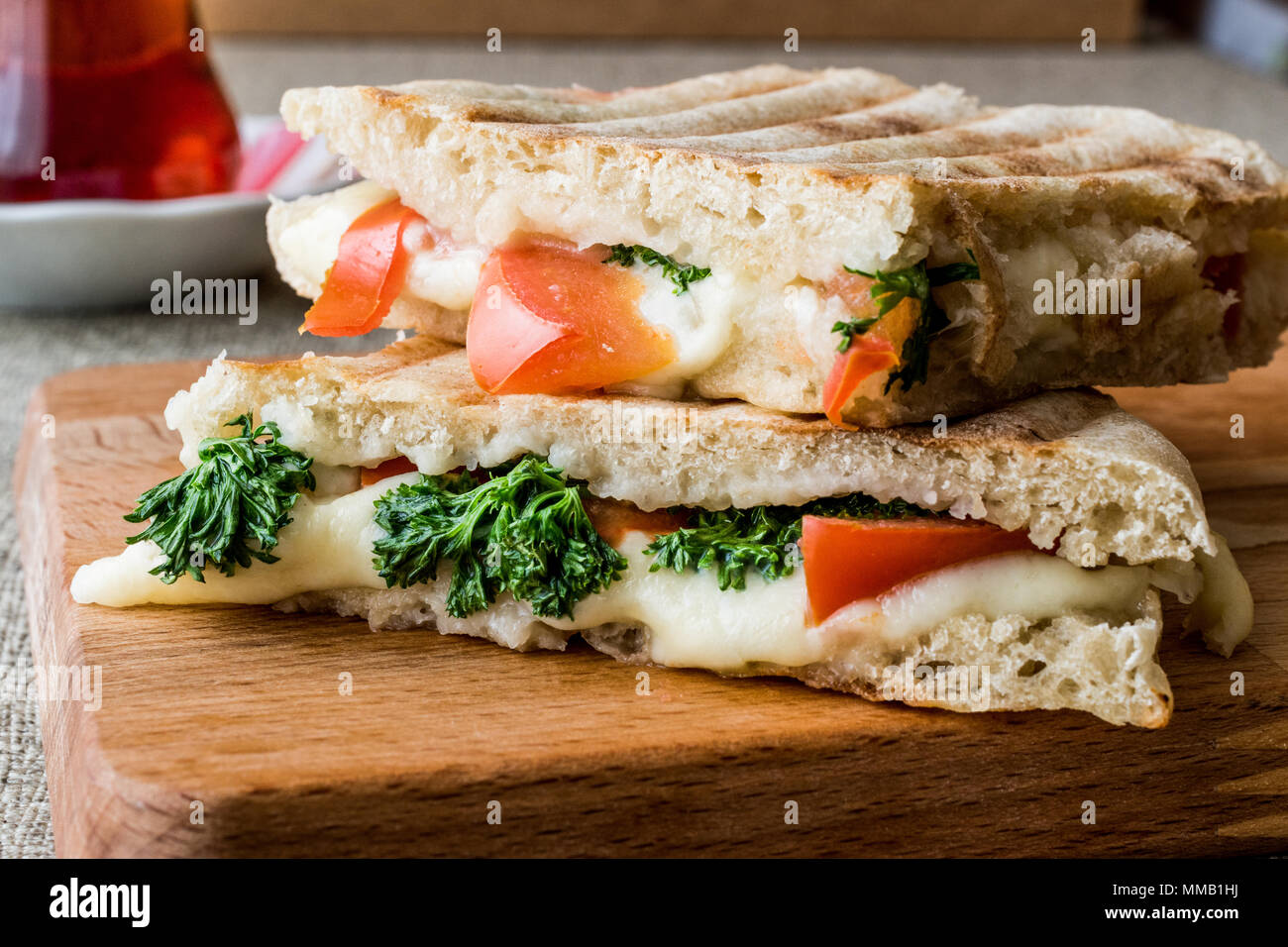 Turkish Bazlama Tost / Toast sandwich with melted cheese, tomatoes ...