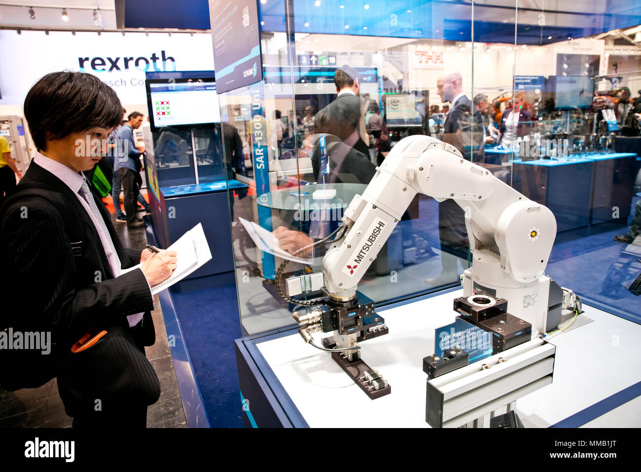 Hannover, Germany - April, 2018: Mitsubishi robot arm on Schunk stand ...