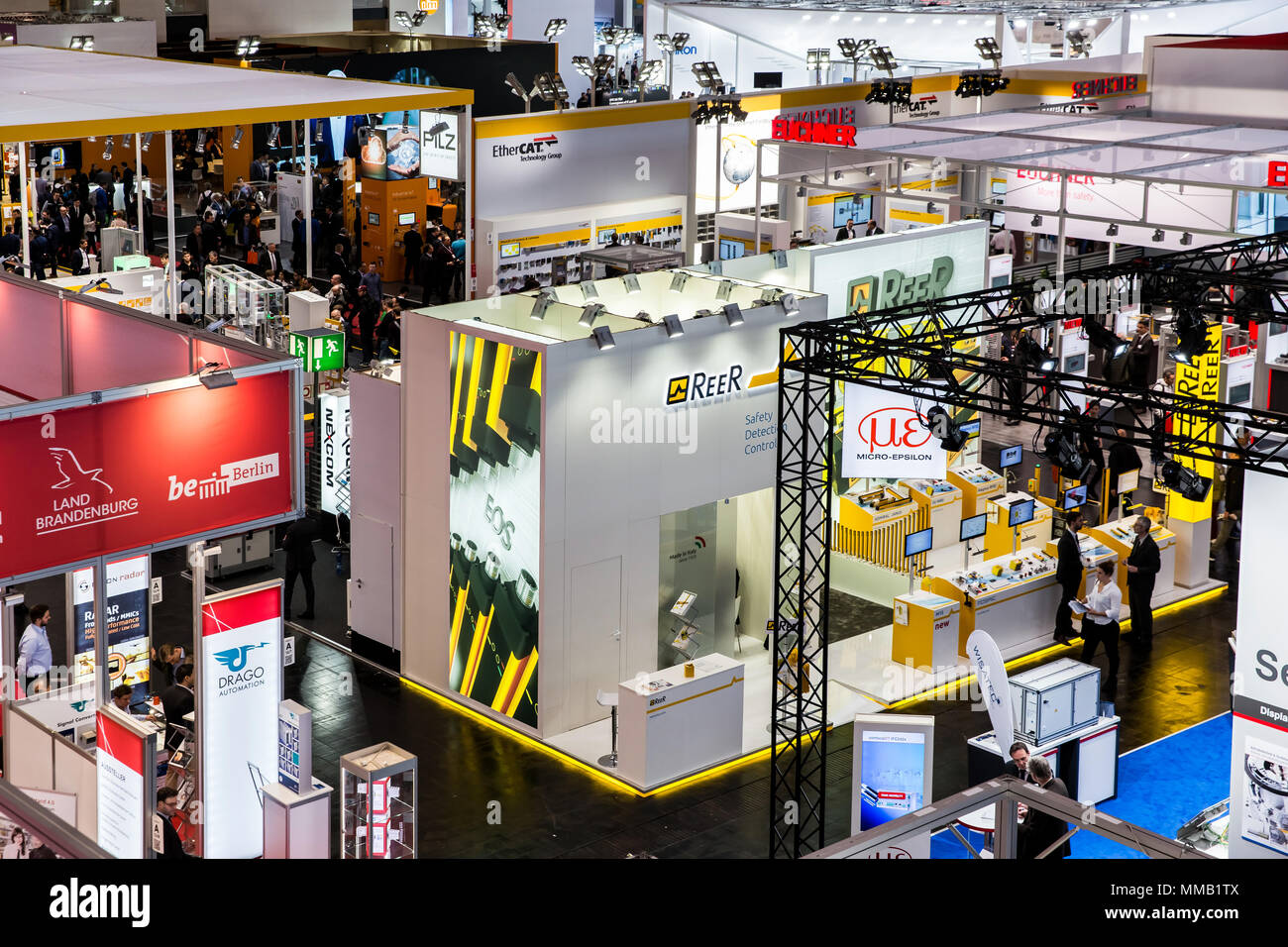 Hannover, Germany - April, 2018: Visitors in exhibition stands and ...