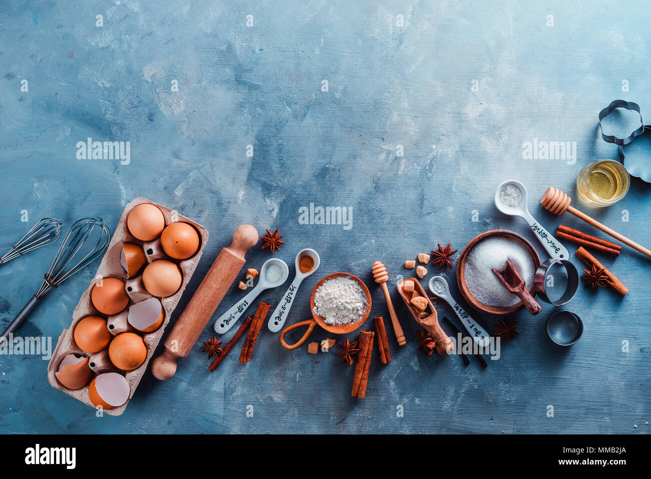 Cooking tools and ingredients concept flat lay with copy space. Baking ...