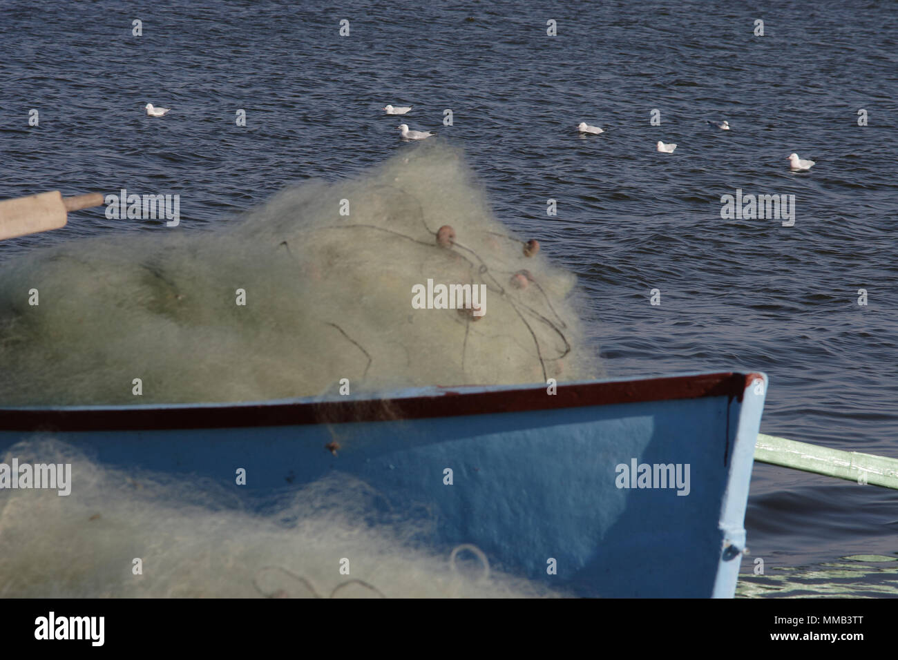 Boat and Net Stock Photo - Alamy
