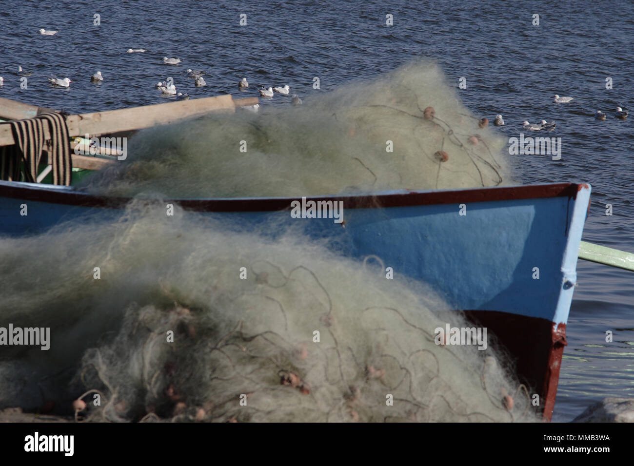 Boat and Net Stock Photo - Alamy