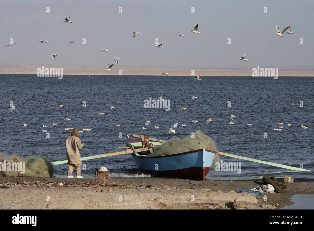 Fisherman at work Stock Photo - Alamy