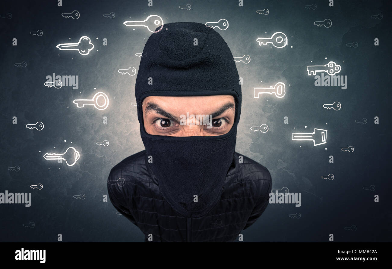 Burglar standing with tools in his hand Stock Photo - Alamy
