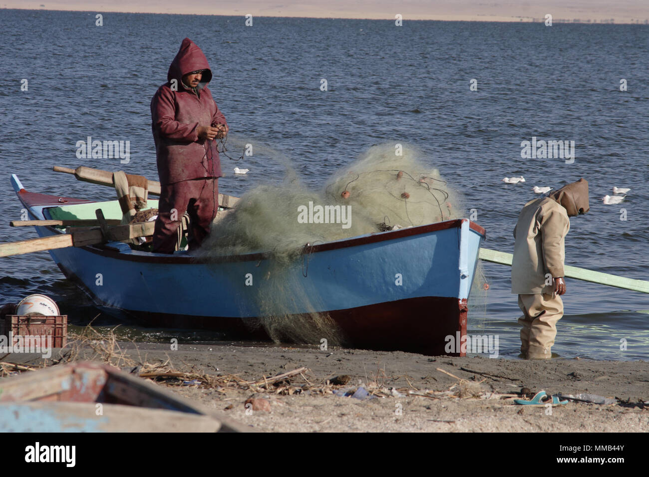 Fishermen at work Stock Photo - Alamy