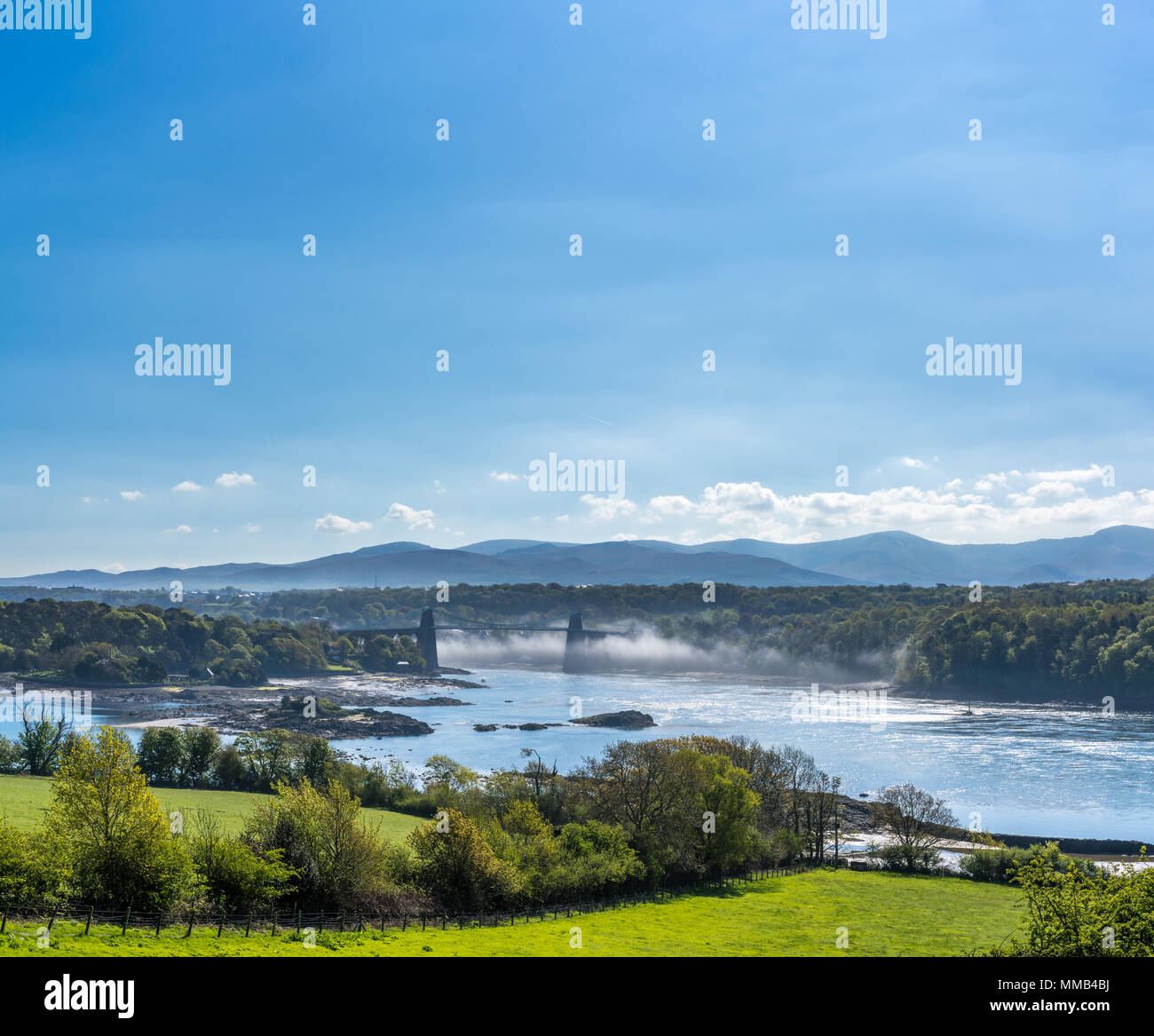 Menai Bridge and mist over the Menai straits between north Wales and ...