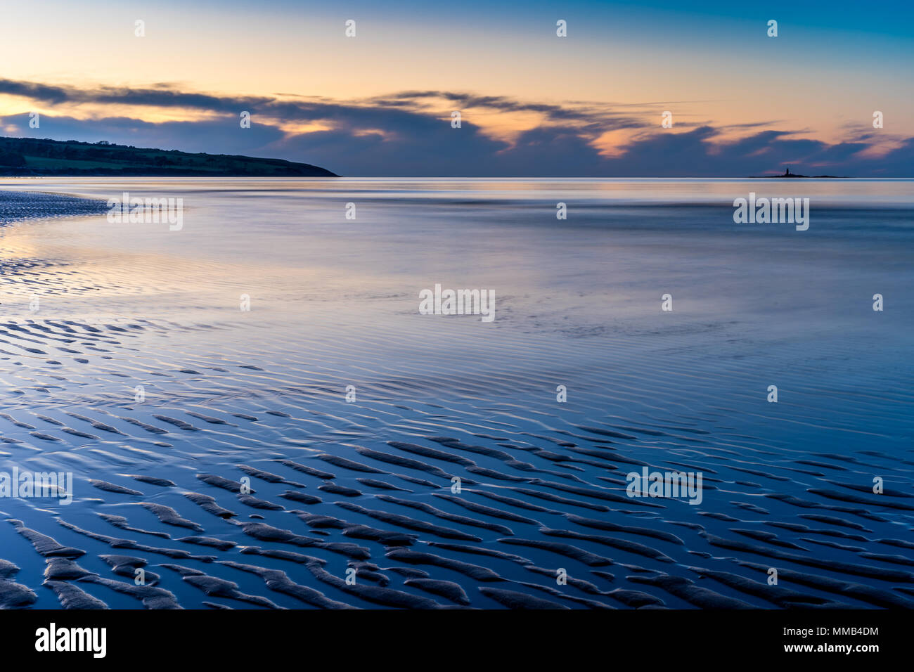LLigwy Beach near Moelfre, Anglesey North Wales at sunset Stock Photo ...