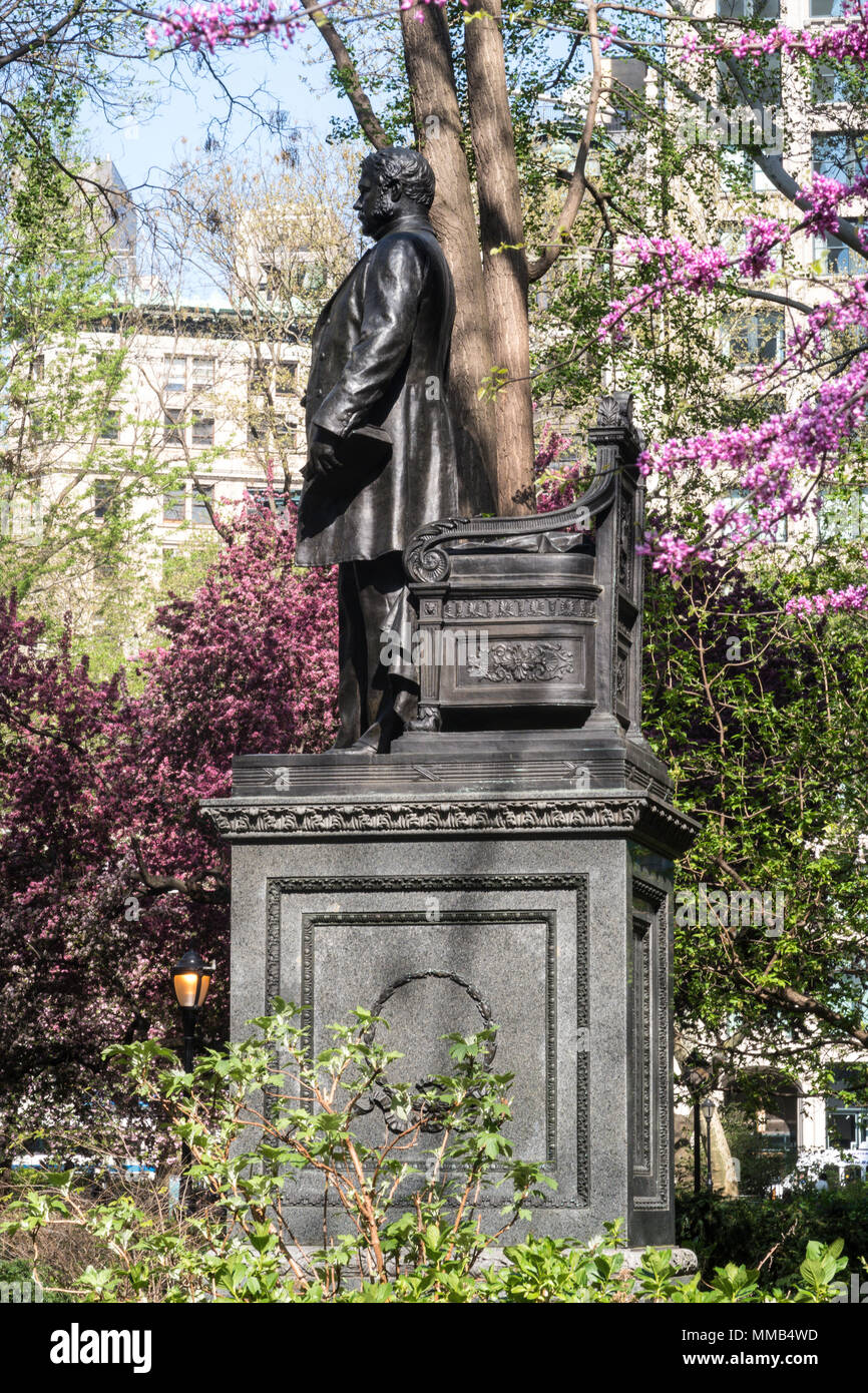 Chester A. Arthur Statue is surrounded by beautiful spring flowering ...