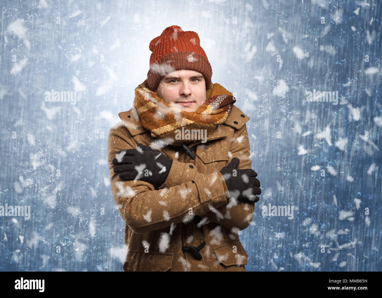 Handsome young boy shivering and trembling at snowstorm concept Stock ...