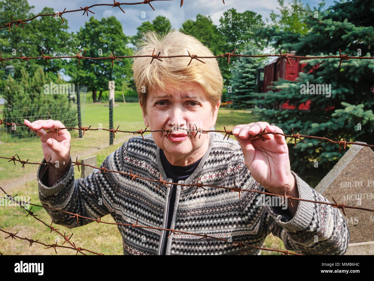 Barbed wire woman hi-res stock photography and images - Alamy