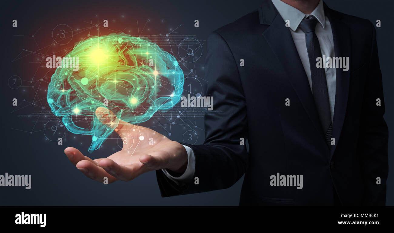 Holding brain hologram human hand hi-res stock photography and images ...