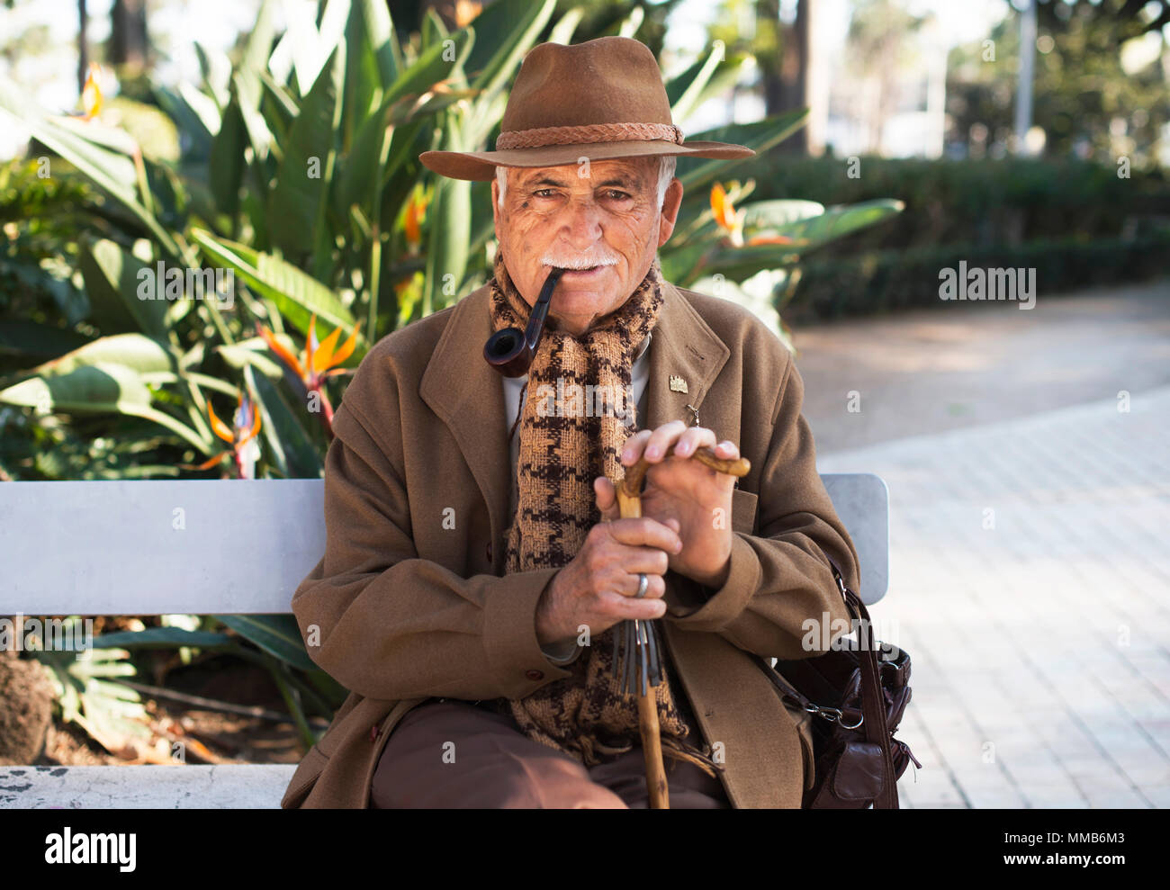 TRAVEL SPAIN PIPE SMOKING MAN Stock Photo - Alamy