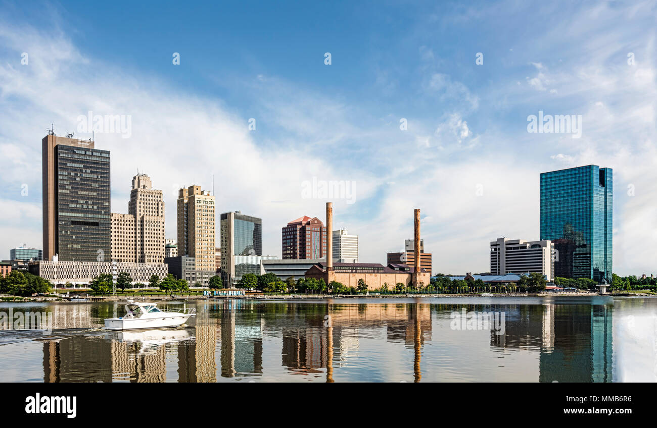 A panoramic view of downtown Toledo Ohio's skyline reflecting into the ...