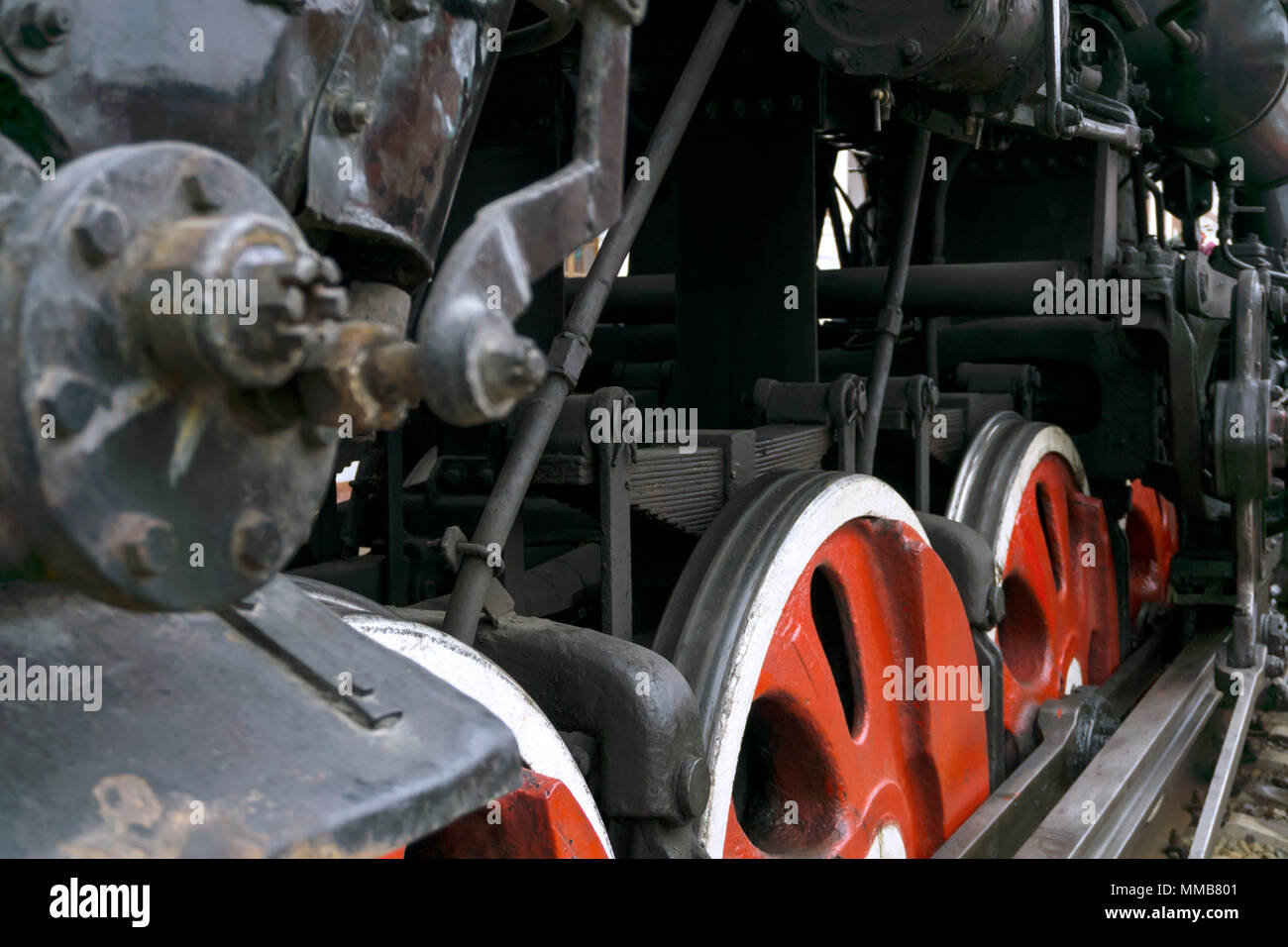 fragment of vintage functioning steam locomotive with leading wheels ...
