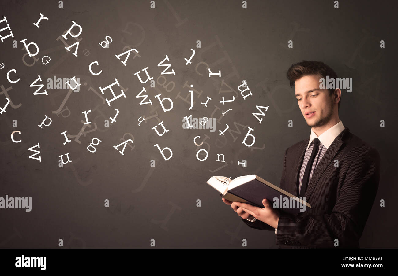 Open book flying alphabet hi-res stock photography and images - Alamy