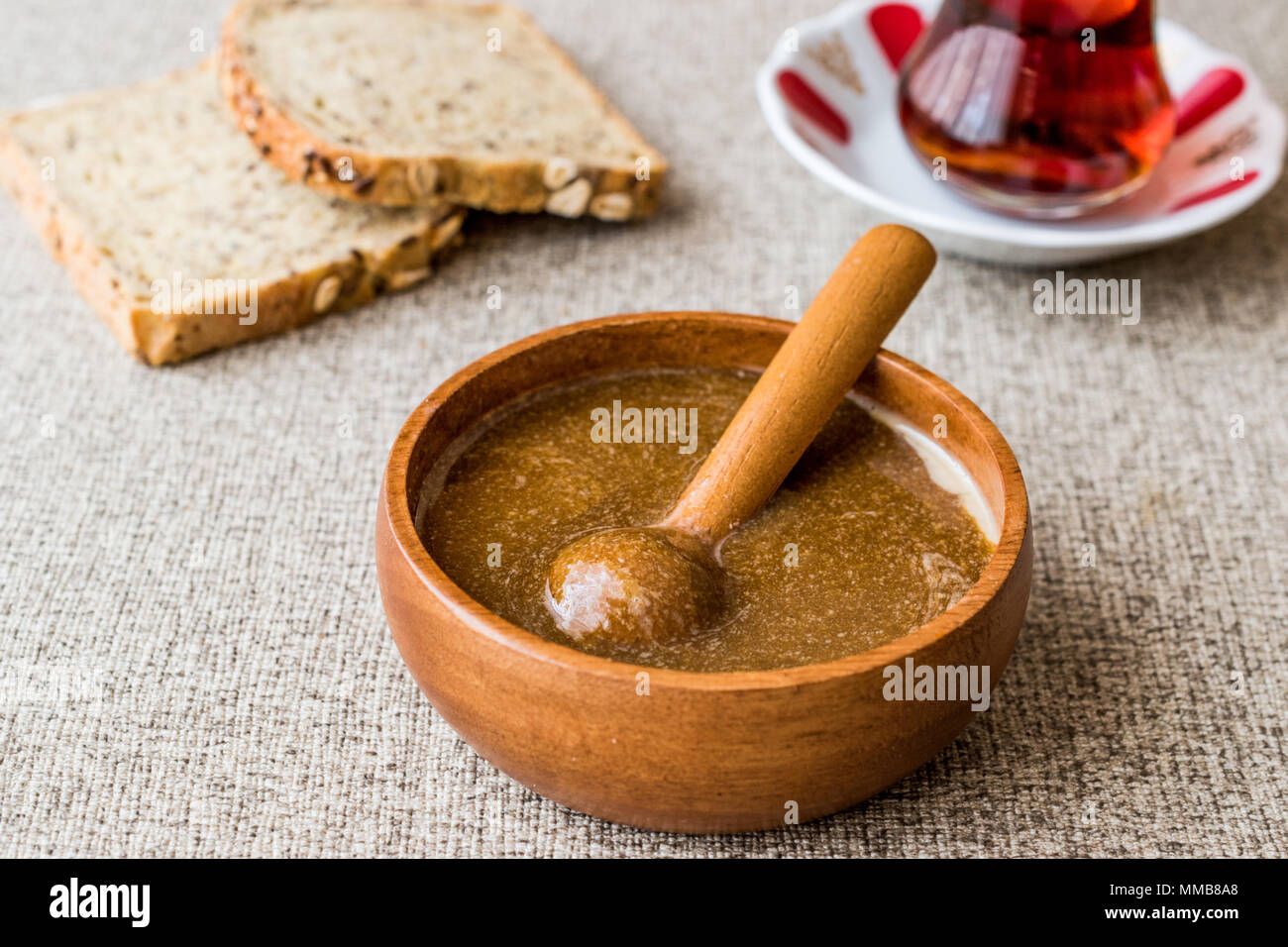 Turkish Tahin Pekmez / Tahini and Molasses with tea. breakfast concept ...