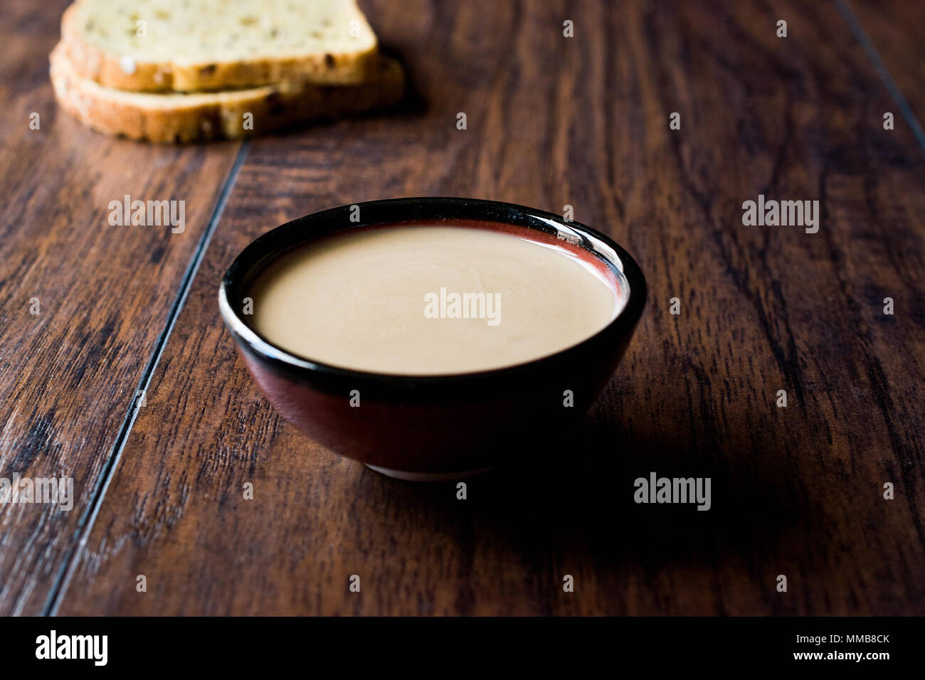Turkish Tahini or Tahin with Bread and Knife. Traditional Food Stock ...
