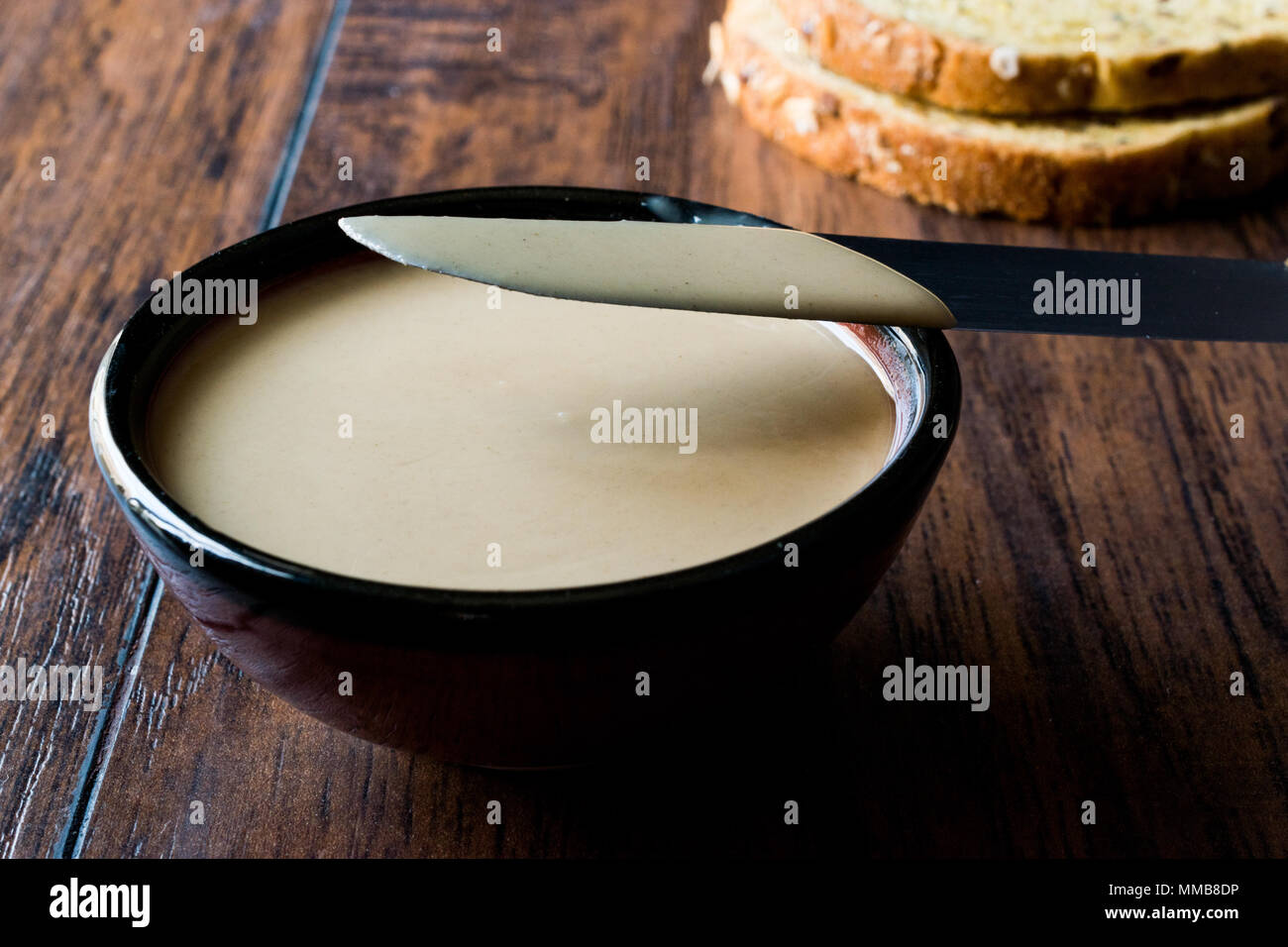 Turkish Tahini or Tahin with Bread and Knife. Traditional Food Stock ...