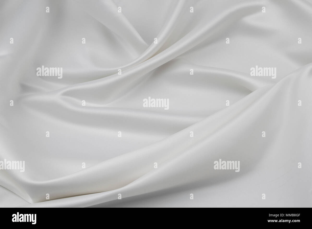 Closeup of rippled white silk fabric Stock Photo - Alamy