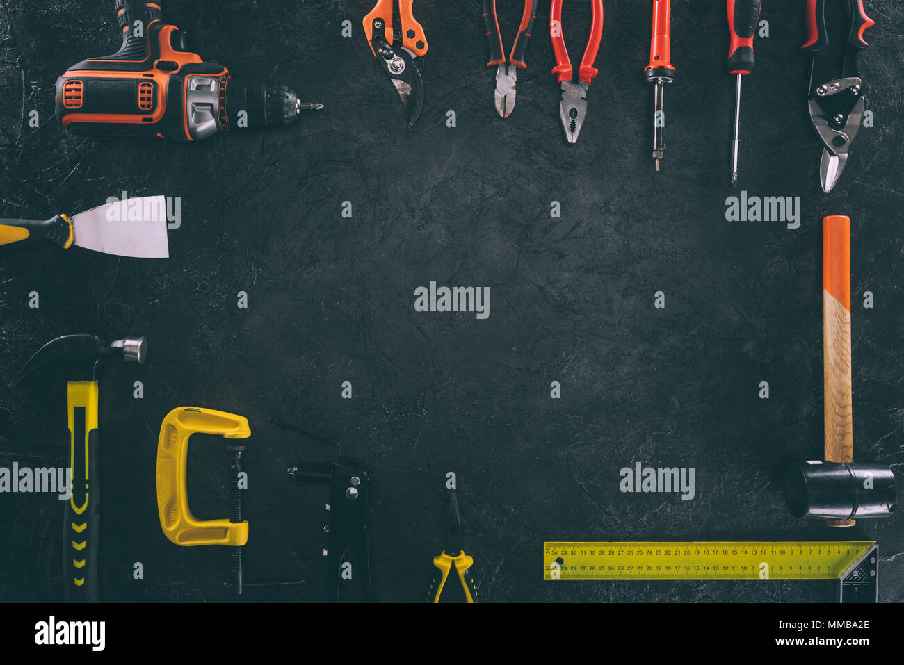 top view of set of mechanical equipment on dark tabletop Stock Photo ...