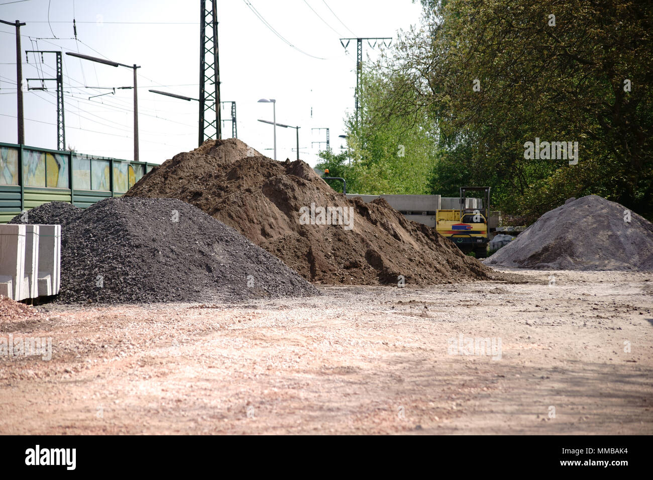 The excavated soil with sand piles of a construction site at the ...