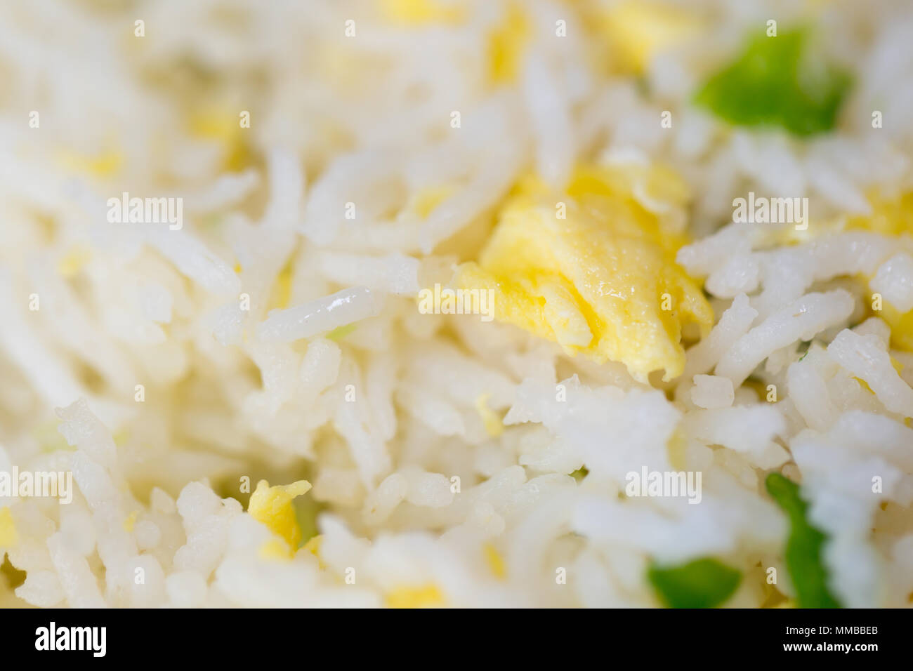 White steamed rice with slices of fried egg close up Stock Photo - Alamy