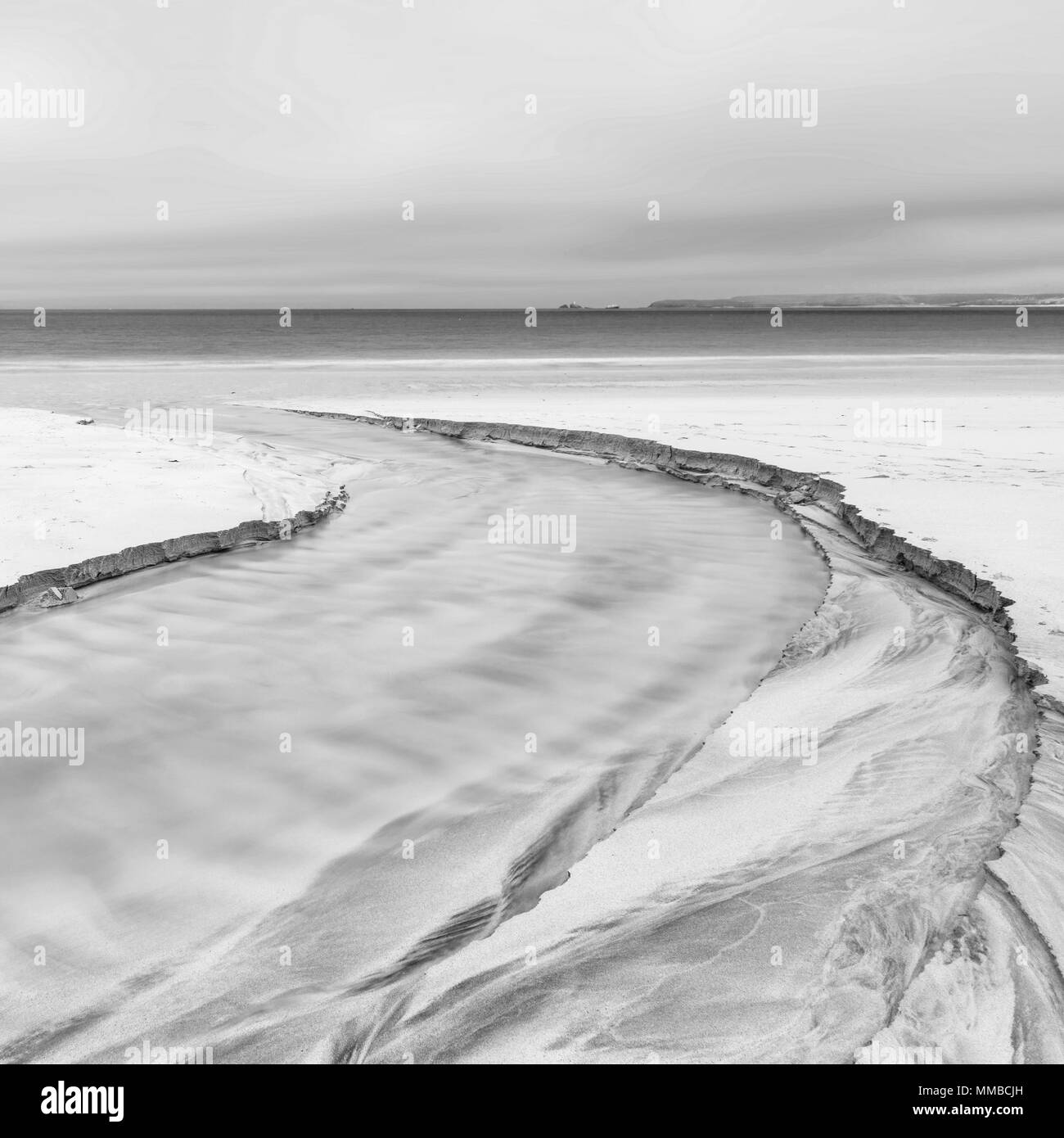 Lovely minimalist landscape black and white image of empty beach at low ...