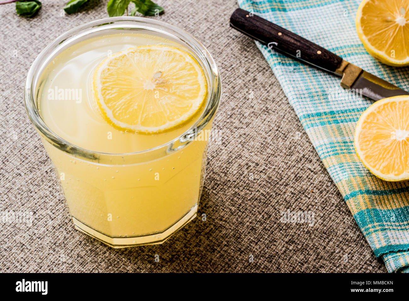 Lemonade drink of soda water with mint leaves and lemon. Summer ...