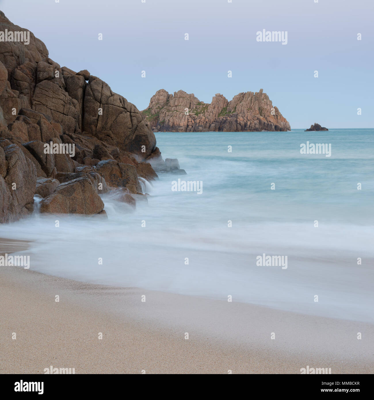 Beautiful sunset landscape image of Porthcurno beach on South Cornwall ...