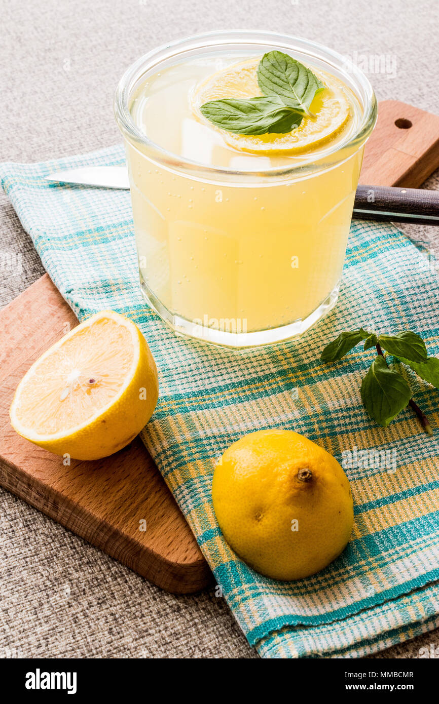 Lemonade drink of soda water with mint leaves and lemon. Summer ...
