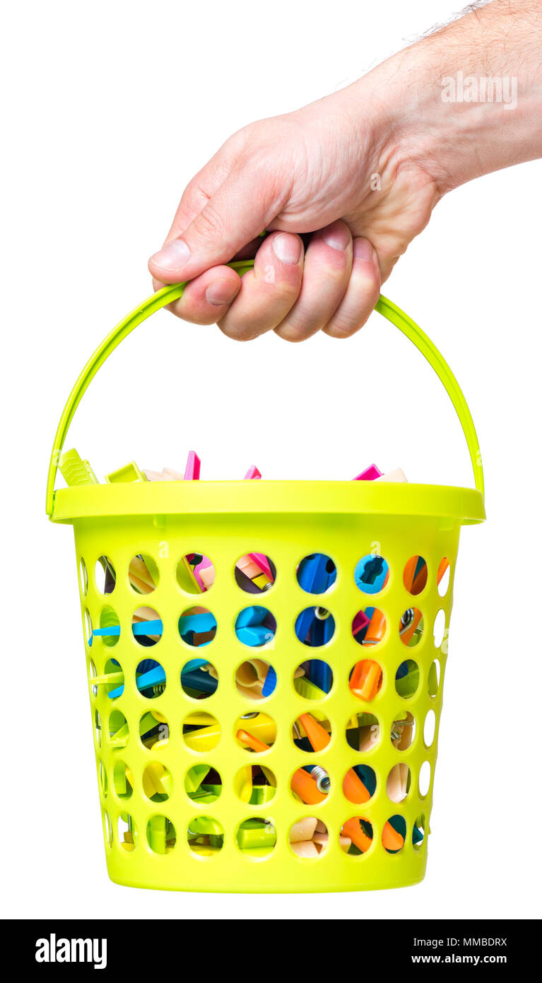 Hand hold bucket with clothespin Stock Photo - Alamy