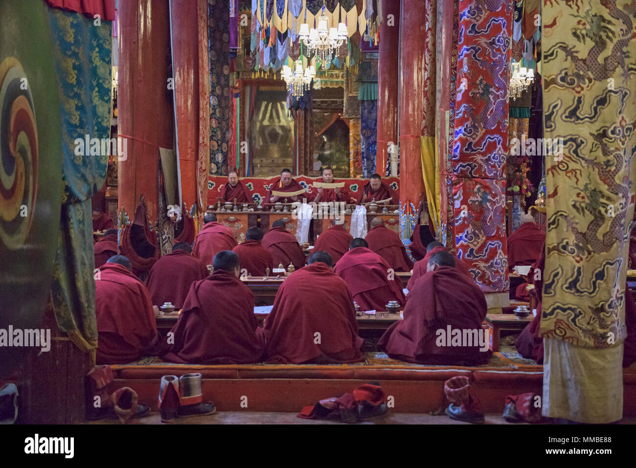 Tibetan monks inside the Gonchen Monastery in Dege, Sichuan, China ...