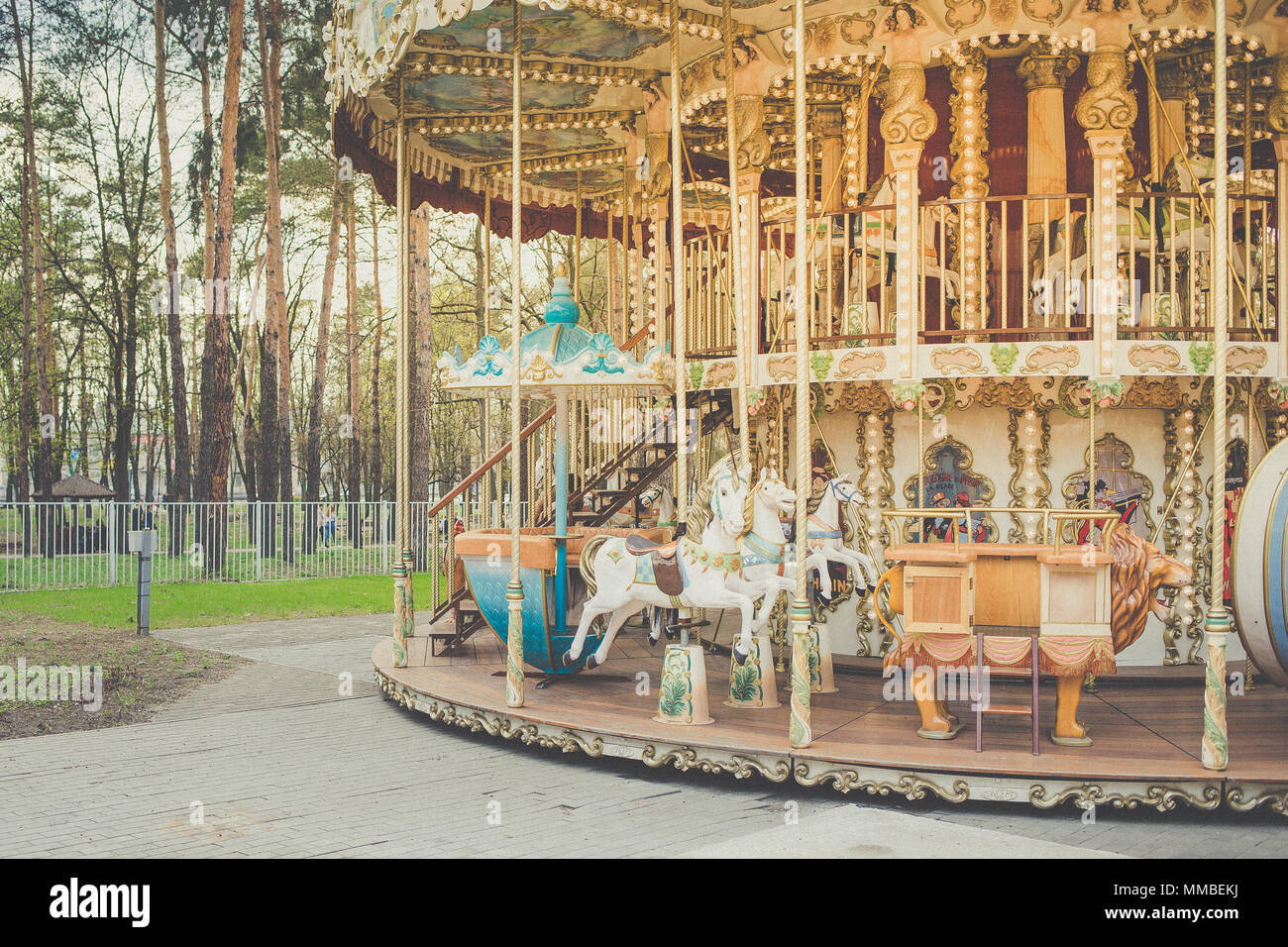 Outdoor vintage flying horse carousel in the city. beautiful bright ...